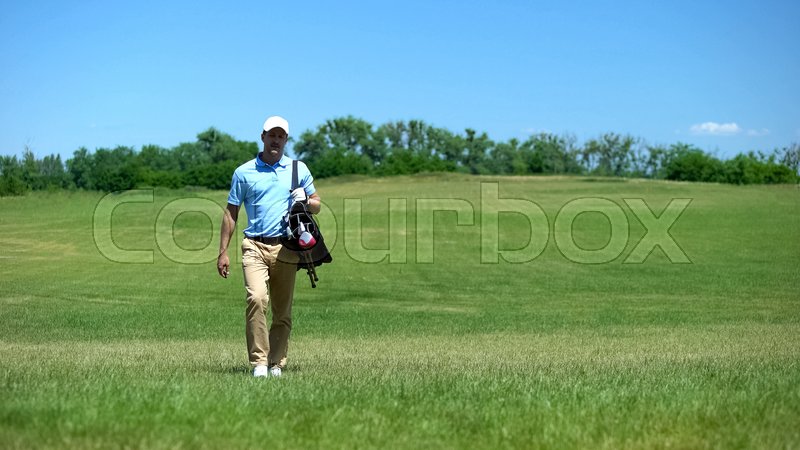 Experienced male coach moving on course ... | Stock image | Colourbox