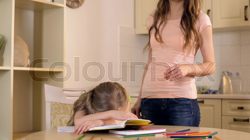 Overprotective mother controlling ... | Stock image | Colourbox