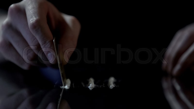 Cocaine powder lines on glass table, ... | Stock image | Colourbox