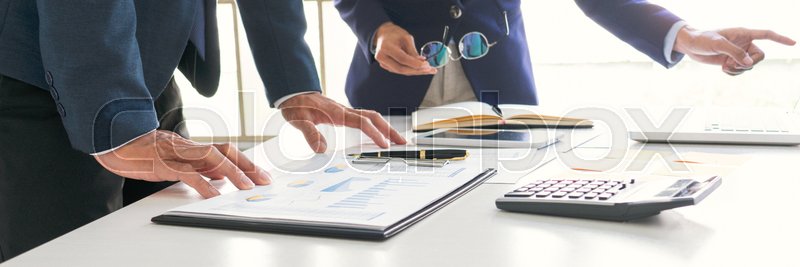 Manager giving advice to new ... | Stock image | Colourbox