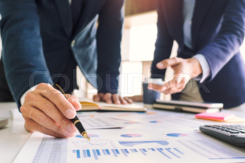 Manager giving advice to new ... | Stock image | Colourbox