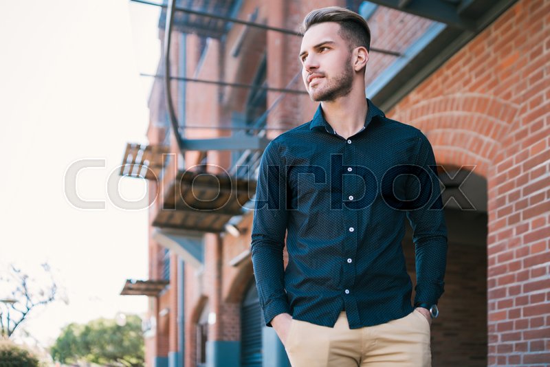 Portrait of attractive young man ... | Stock image | Colourbox