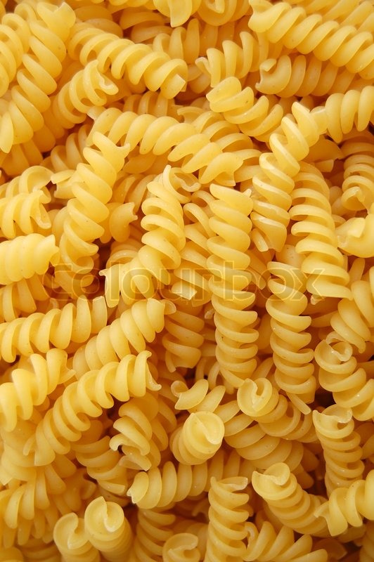Twirls pasta background | Stock Photo | Colourbox