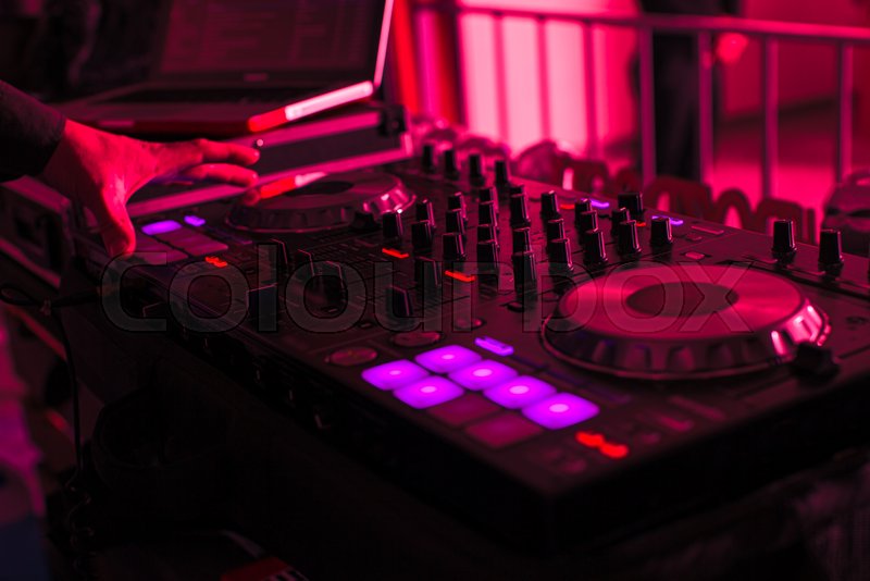 Dj mixing music in night club, close ... | Stock image | Colourbox
