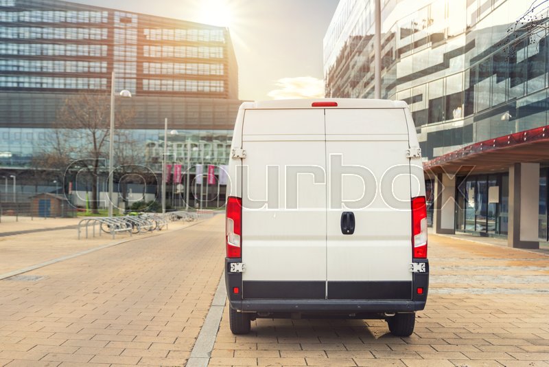 Small cargo delivery van driving in ... | Stock image | Colourbox