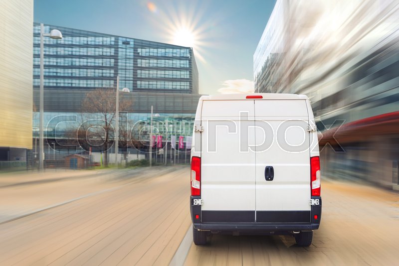 Small cargo delivery van driving in ... | Stock image | Colourbox