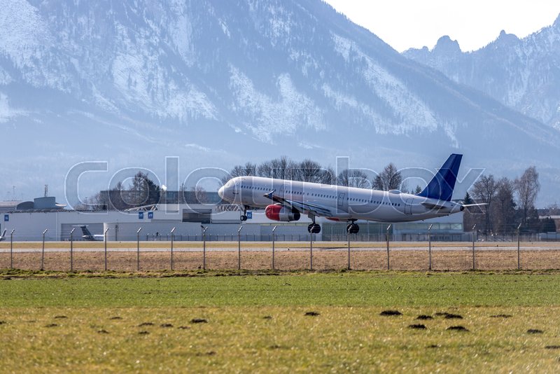 Airplane arrival at the airport. Travel ... | Stock image | Colourbox