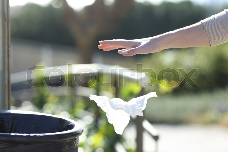 Close up of a woman hand throwing ... | Stock image | Colourbox