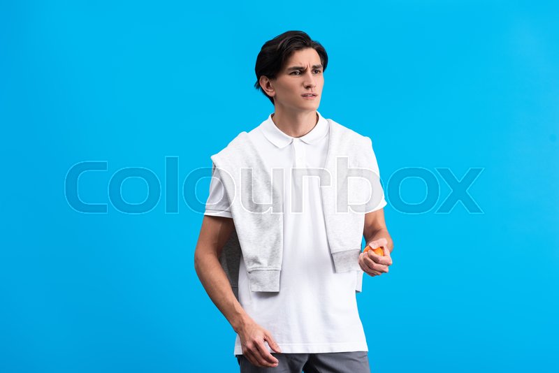 Aggressive young man squeezing stress ... | Stock image | Colourbox