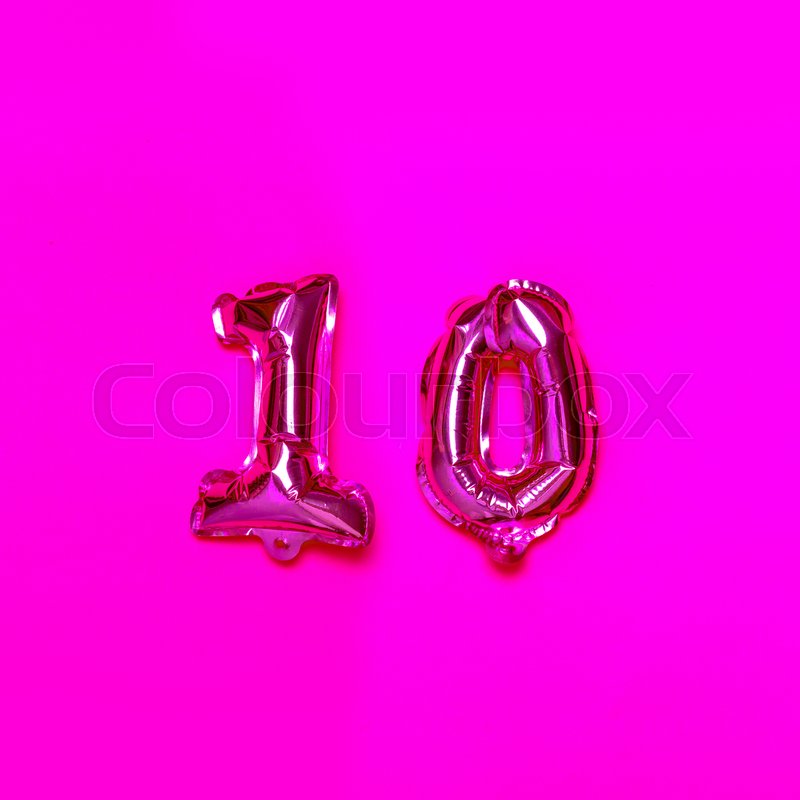 10 number helium gold balloon on a pink ... | Stock image | Colourbox