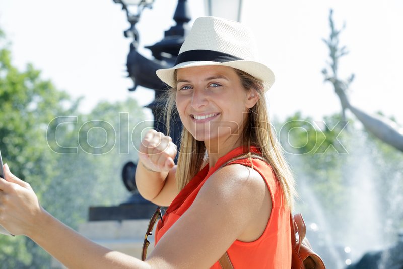 Portrait of happy stylish tourist woman | Stock image | Colourbox