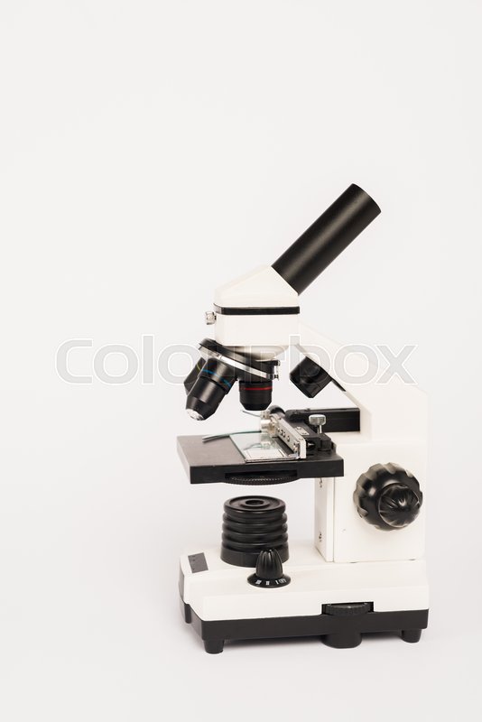 Modern microscope isolated on white ... | Stock image | Colourbox