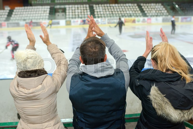 They are clapping for the players | Stock image | Colourbox