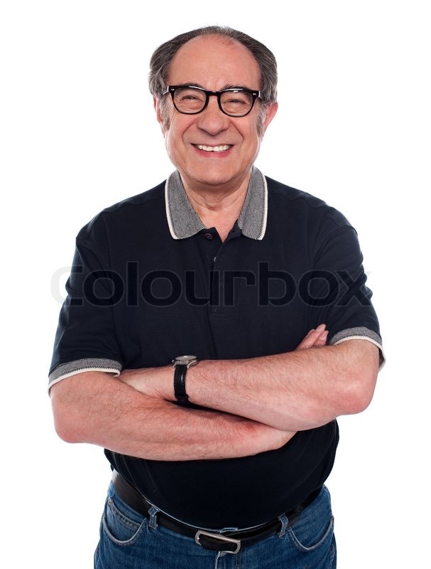 Cheerful old man standing with arms ... | Stock image | Colourbox