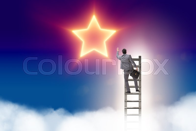The businessman reaching out for stars | Stock image | Colourbox