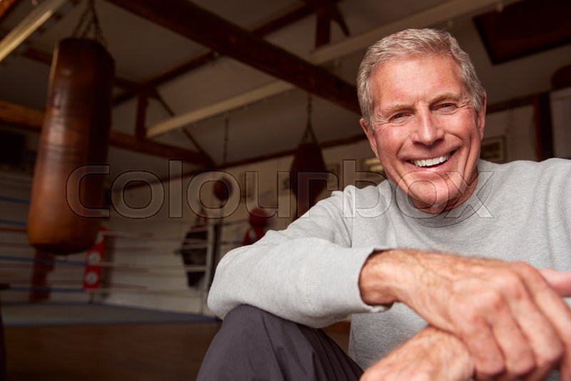 Portrait Of Smiling Senior Male Boxing ... | Stock image | Colourbox
