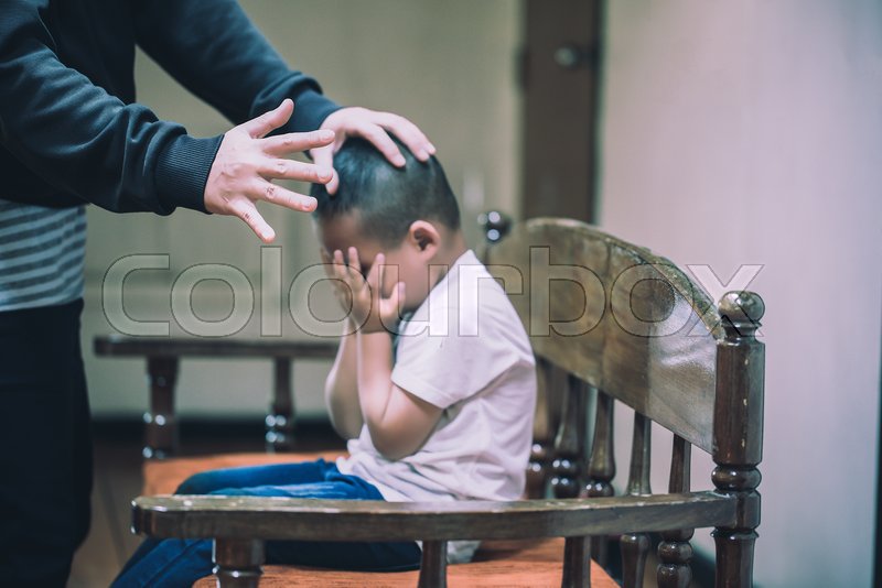 Mother slaps her baby boy in the face ... | Stock image | Colourbox