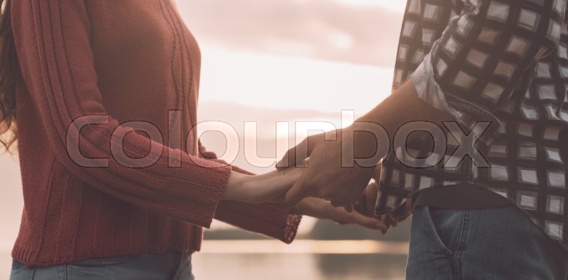 Romantic young loving couple holding ... | Stock image | Colourbox
