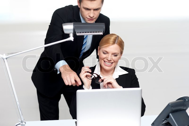 Man pointing finger at laptop screen | Stock image | Colourbox