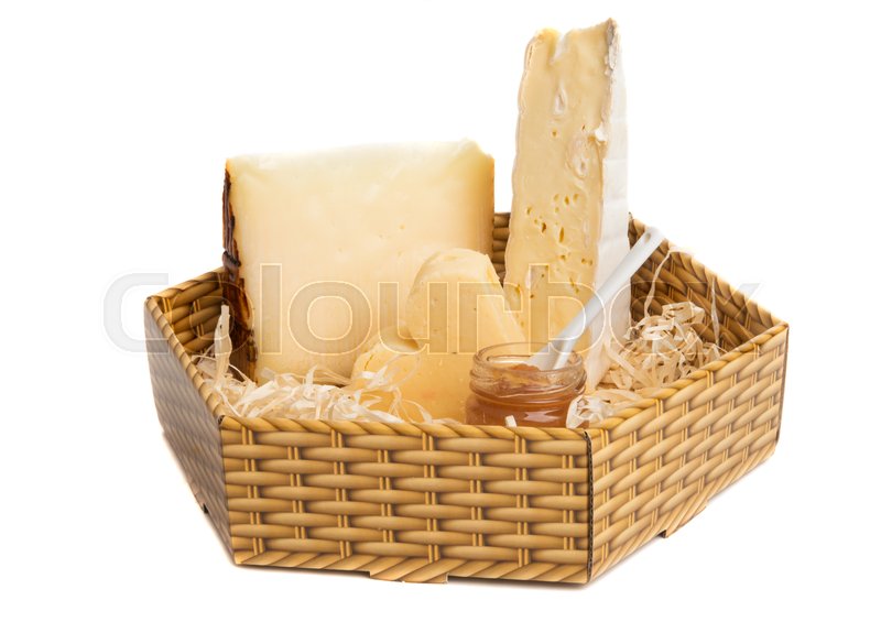 Pieces of cheese isolated on white ... | Stock image | Colourbox