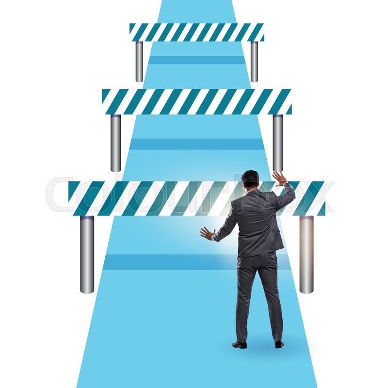 The businessman facing running barriers ... | Stock image | Colourbox