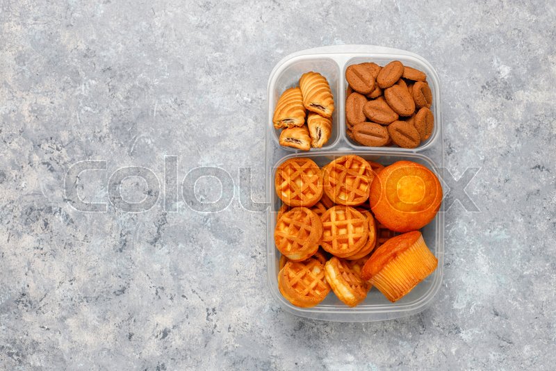 Unhealthy lunch box with ... | Stock image | Colourbox