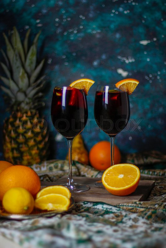 Two glasses of red wine sangria with ... | Stock image | Colourbox