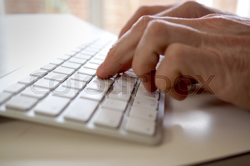 Male hands typing on computer | Stock image | Colourbox