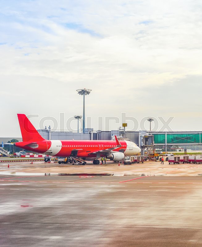 Red plane at airfieald by airport ... | Stock image | Colourbox