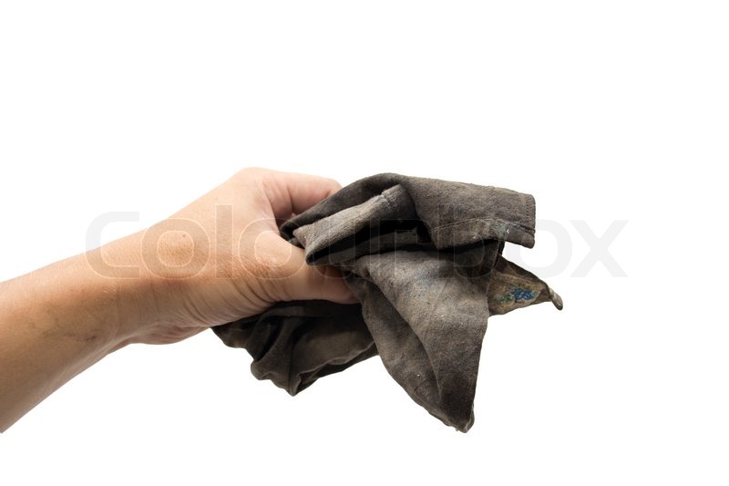 Dirty rag in his hand on a white ... | Stock image | Colourbox