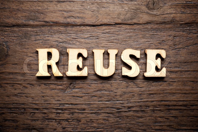 Reuse word on a wood table. | Stock image | Colourbox