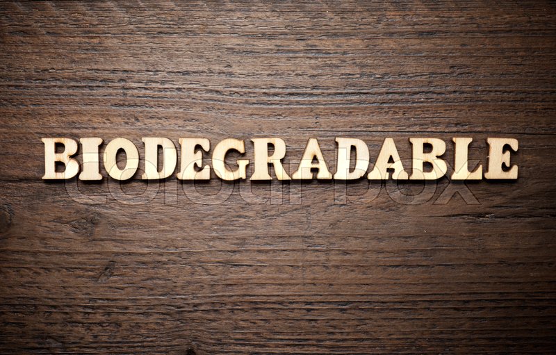 Biodegradable word on a wood table. | Stock image | Colourbox
