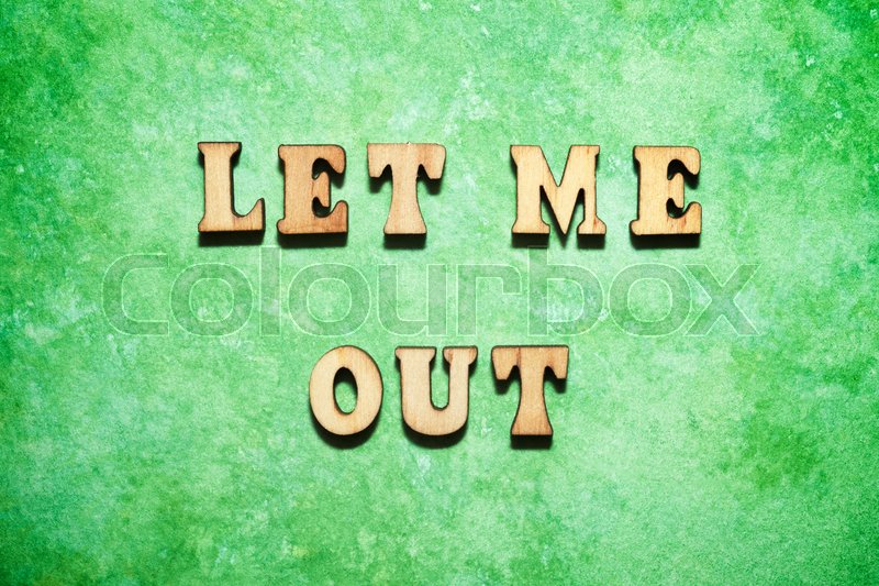 Let me out sentence on a green paper. | Stock image | Colourbox