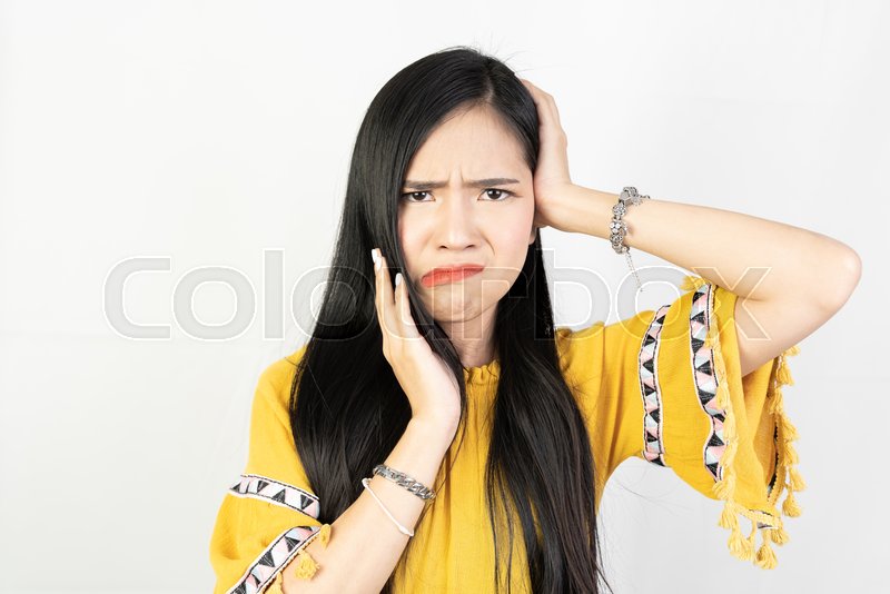 Portrait of young woman making unhappy ... | Stock image | Colourbox