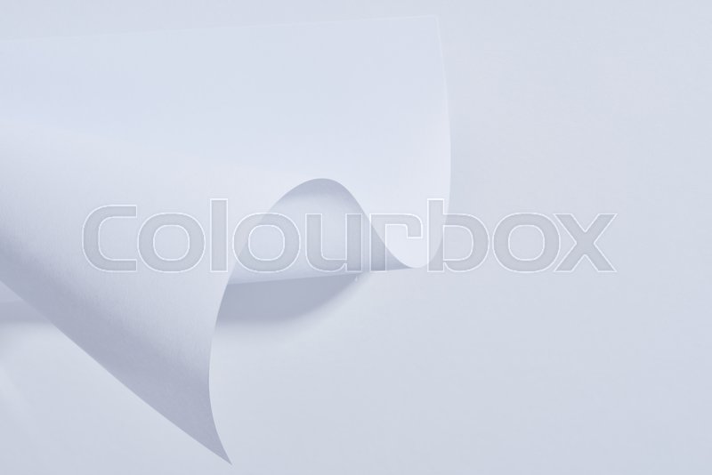 Close up view of curved paper sheet on ... | Stock image | Colourbox