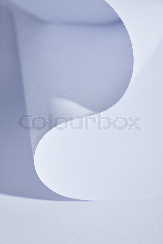 Close up view of curved paper sheet on ... | Stock image | Colourbox