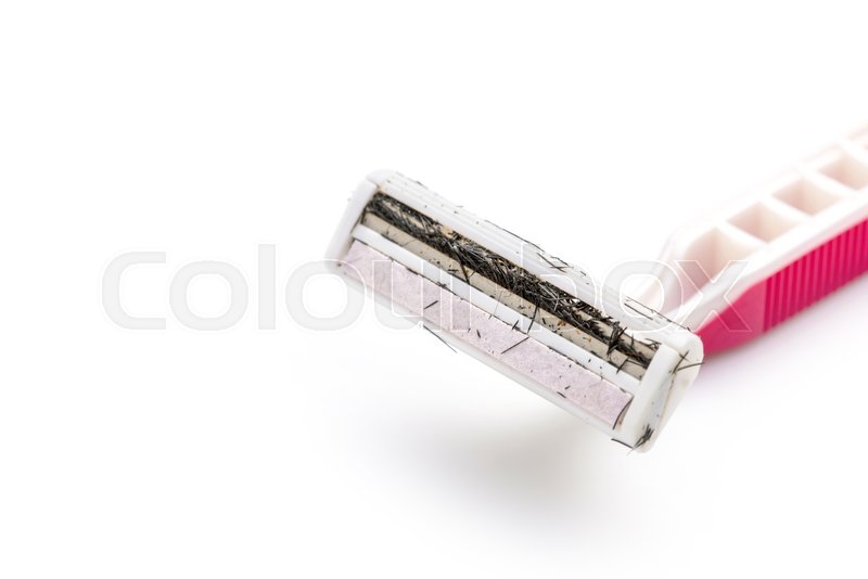 Close up pink used razor blade. Studio ... | Stock image | Colourbox