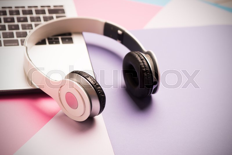 Headphones and laptop computer closeup. ... | Stock image | Colourbox