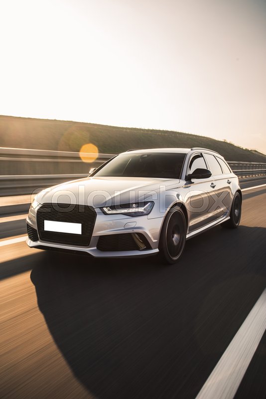 Silver color hatchback driving on the ... | Stock image | Colourbox
