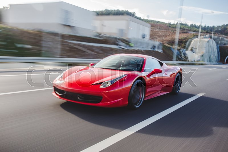Red luxury model sport car profile view ... | Stock image | Colourbox