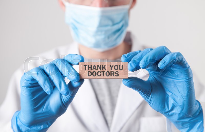 Doctor showing Thank You Doctors text ... | Stock image | Colourbox