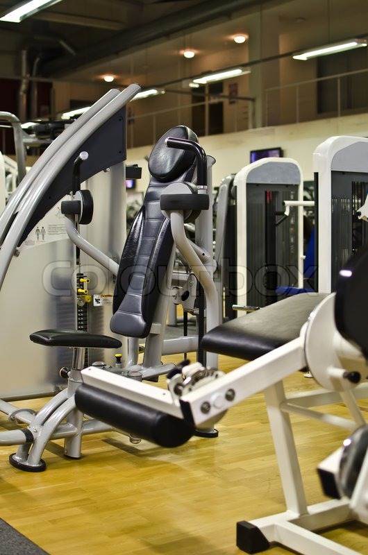 Athletic gym machine in fitness club | Stock image | Colourbox
