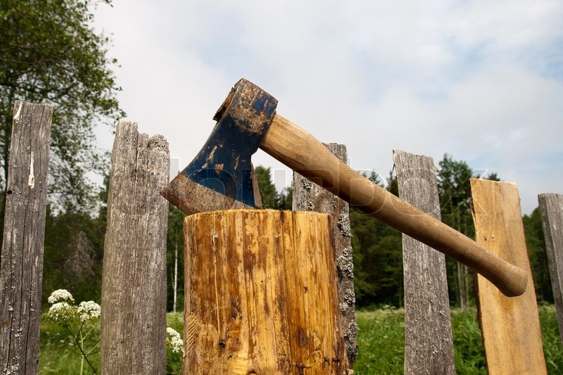 Axe in a log | Stock image | Colourbox