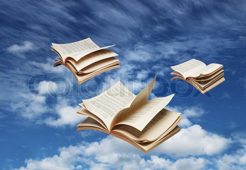 Three open books flying on blue sky | Stock image | Colourbox