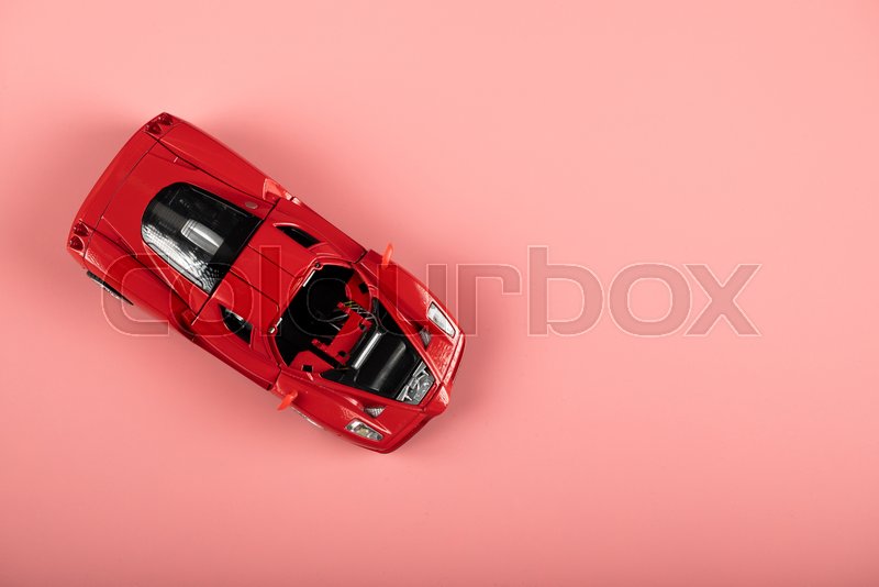 Small red car toy for a kid | Stock image | Colourbox