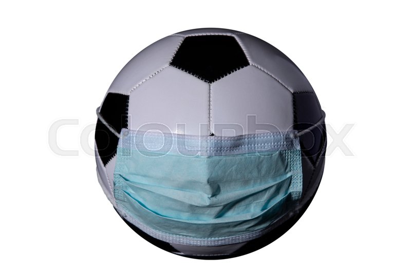 Soccer ball wearing a mask, concept of ... | Stock image | Colourbox