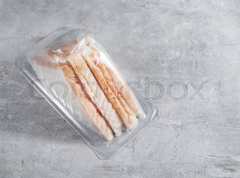 Sandwich in a transparent plastic box ... | Stock image | Colourbox