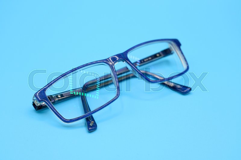 Close up of Blue glasses on blue ... | Stock image | Colourbox