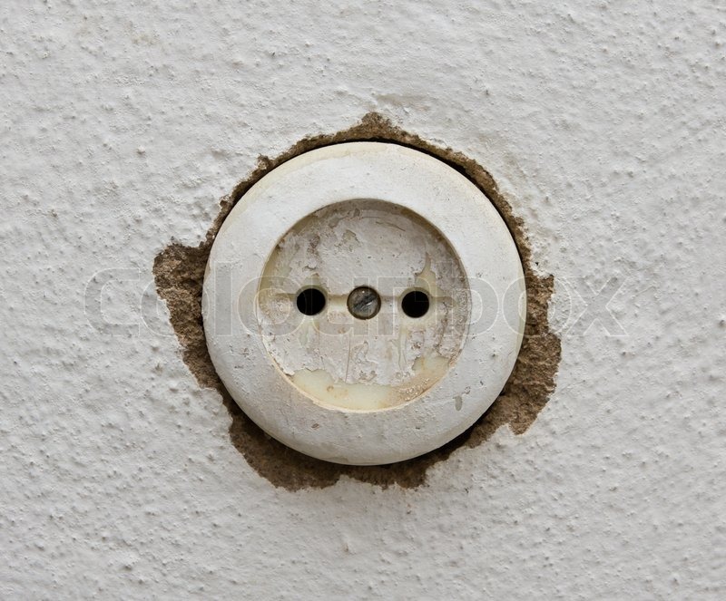 The old outlet on the wall | Stock image | Colourbox