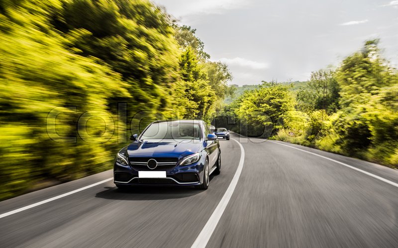 Driving in the nature across rain ... | Stock image | Colourbox